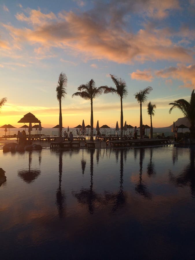 Sunset Over the Sea and Pool Tenerife Stock Photo - Image of sand ...