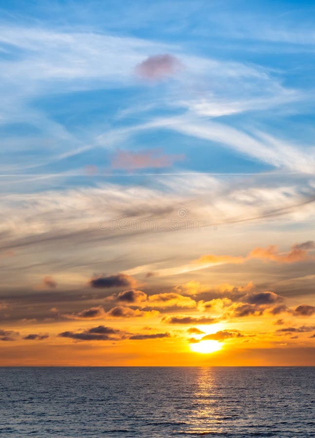 Sunset Over the Sea. Reflection of Sunlight in the Sea Waves. Red and ...