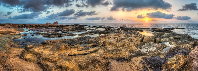 Sunset Over the Sea and Rocky Coast Stock Photo - Image of beach ...