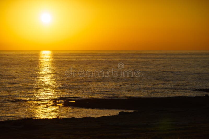 Sunset over sea stock image. Image of landscape, ocean - 202260467