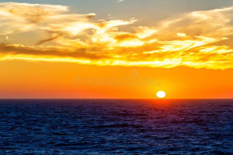 Sunset over sea water stock image. Image of bright, dawn - 40643199