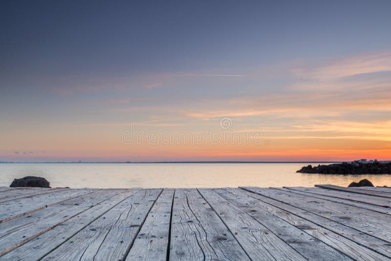 Sunset Over the Sea from Wooden Veranda Stock Photo - Image of morning ...