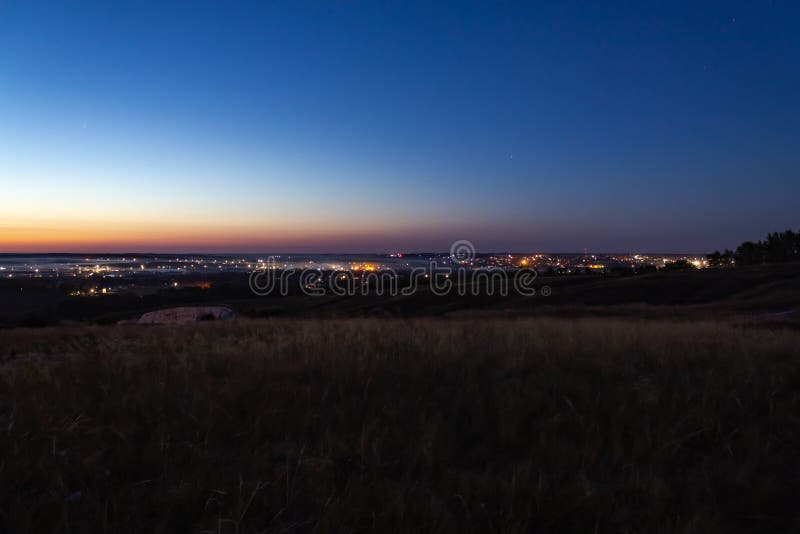 Sunset over a small town stock image. Image of downtown - 190991095