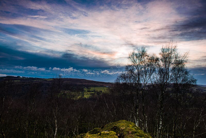 Sunset Over the Valley with Dramatic Clouds. Stock Photo - Image of ...