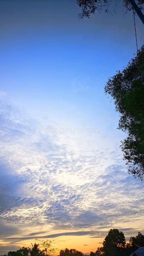 Sunset over the village stock photo. Image of nature - 261552754