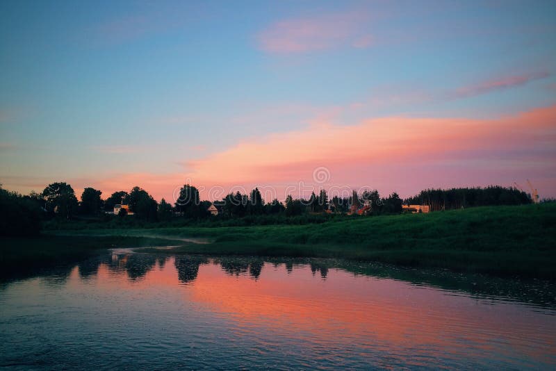 Sunset over the village editorial photography. Image of boat - 56479647
