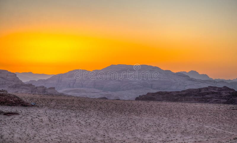 Sunset Over Wadi Rum Desert in Jordan Stock Photo - Image of adventure ...