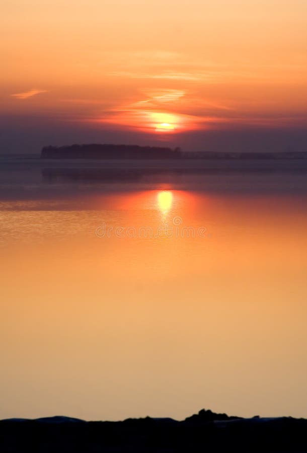 Sunset over the water stock image. Image of ocean, orange - 11494109