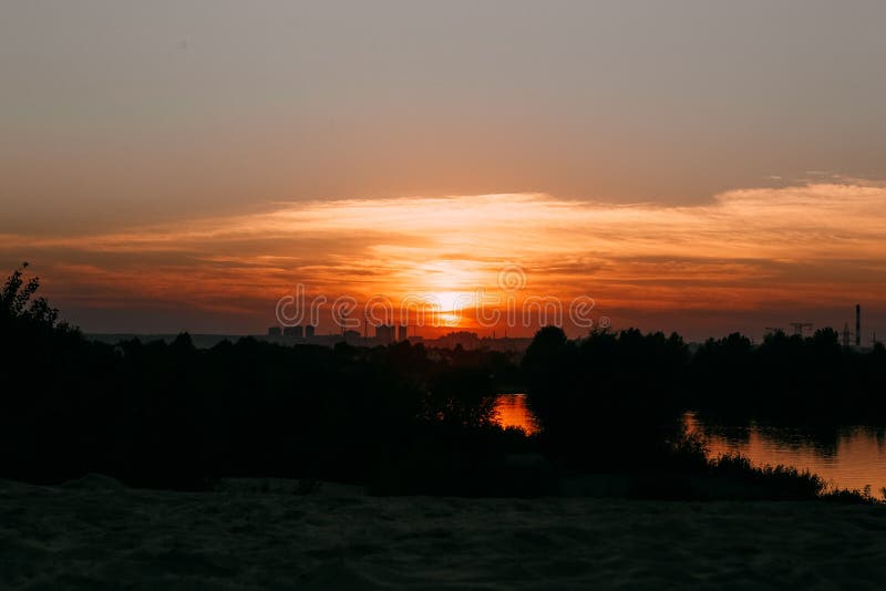 Sunset Over Water Reflection and Rays Stock Photo - Image of evening ...