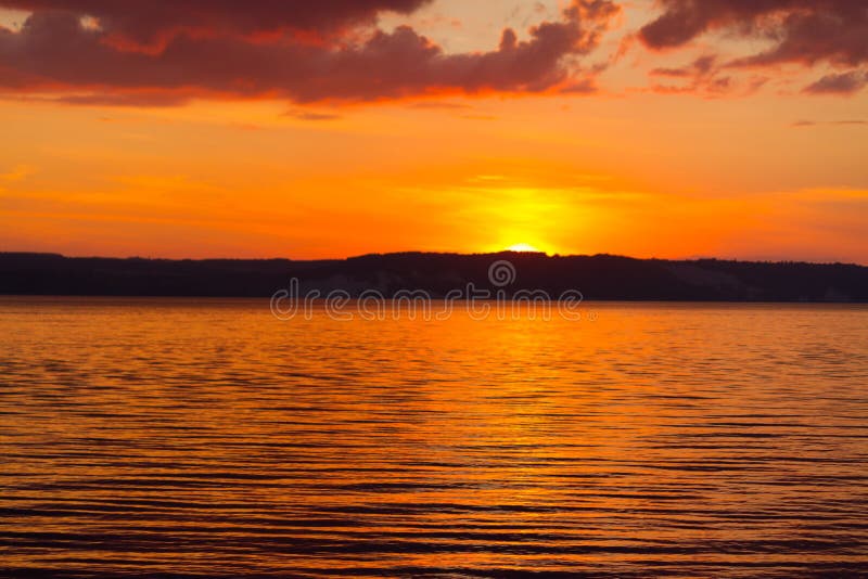 Sunset over the water stock image. Image of ocean, beautiful - 263930677