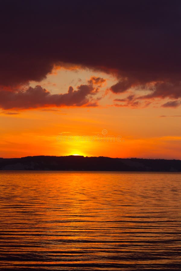 Sunset over the water stock photo. Image of travel, beautiful - 263930846