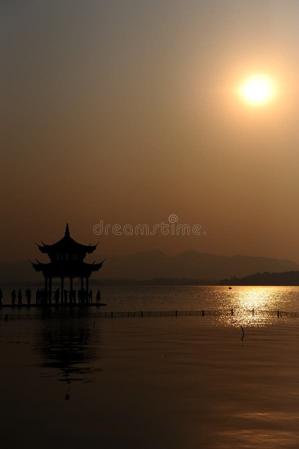 Sunset on Chinese lake stock image. Image of still, quiet - 443947