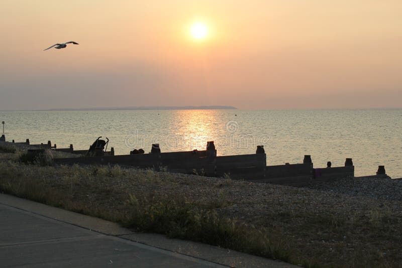 Sunset Over Whitstable Beach Stock Image - Image of colours, reflection ...