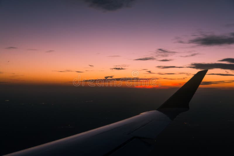 Sunset Over Wing from Airplane Window during Flight Stock Image - Image ...