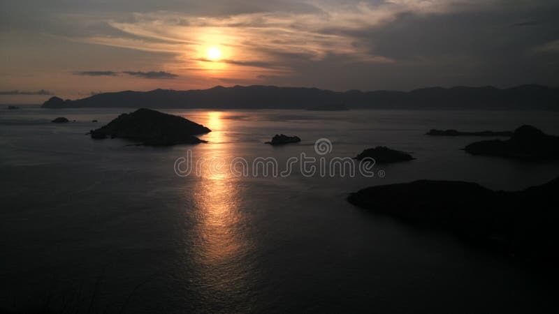 Sunset in padar island stock photo. Image of epic, padar - 73496928