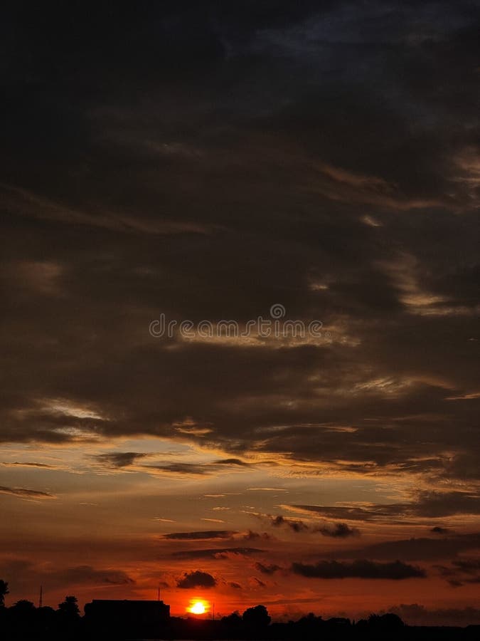 The Sunset Paints the Sky with a Bright Red Color Stock Photo - Image ...