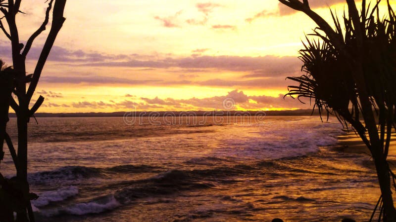 Sunset on Pangandaran Beach, West Java, Indonesia. Stock Photo - Image ...