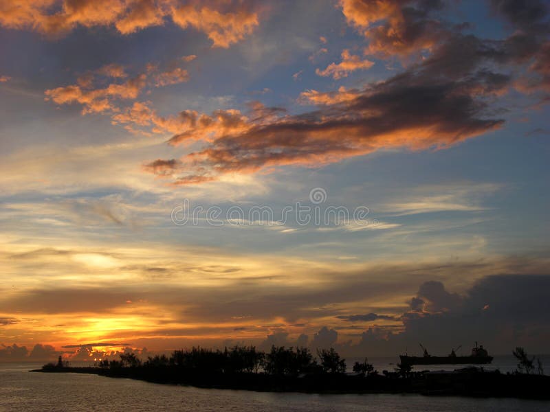 The Sunset in Paradise stock image. Image of island, lighthouse - 1078159