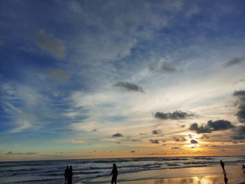 Sunset in Parangtritis Beach Stock Photo - Image of beach, sunrise ...