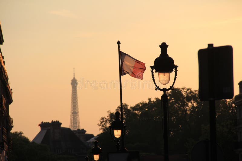 Sunset in Paris with a View of the Eiffel Tower Yellow Light Pole and ...