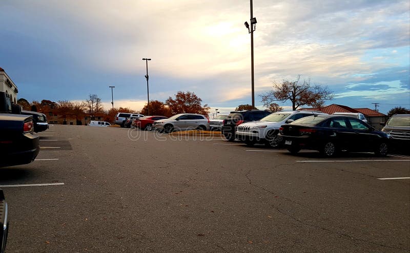 Sunset from a parking lot stock photo. Image of post - 189037274