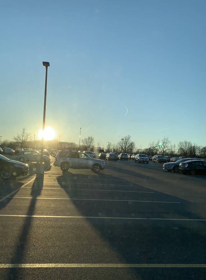 Sunset from a parking lot stock photo. Image of post - 189037274