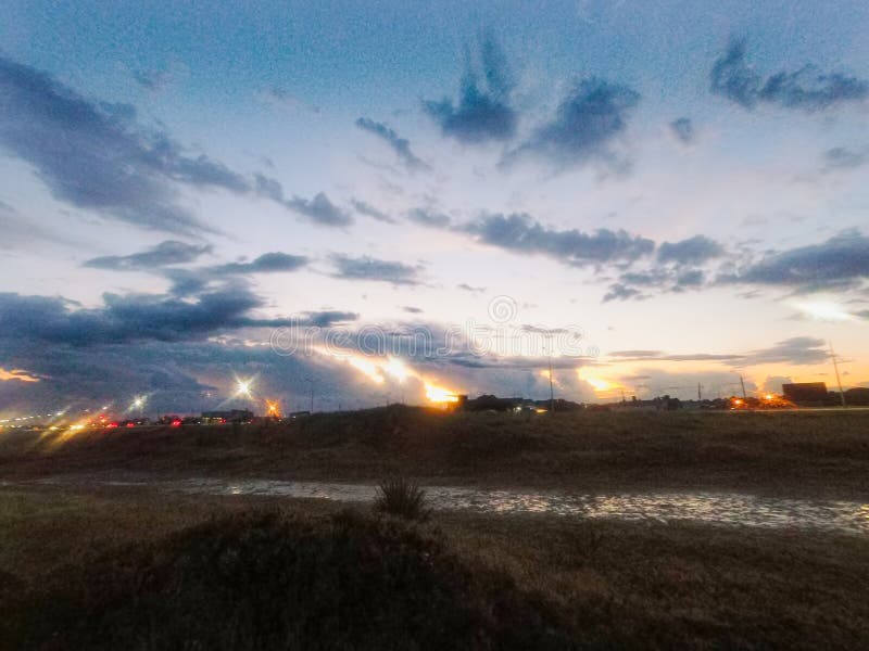 Sunset on the Pasture Fields Road and Cars at Night in Santa Clara Del ...