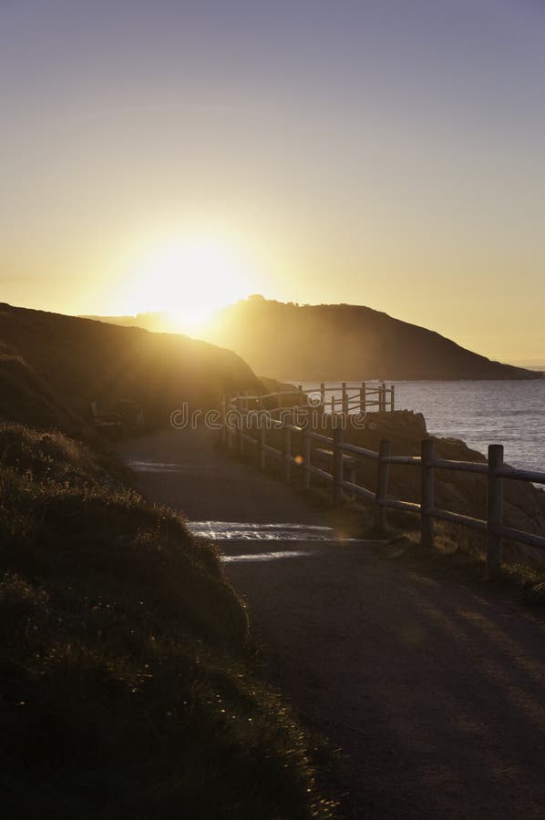 Sunset on a Path Near the Sea Stock Photo - Image of nature, ocean ...