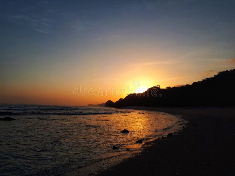 Before the sunset stock image. Image of sunset, beach - 205950401