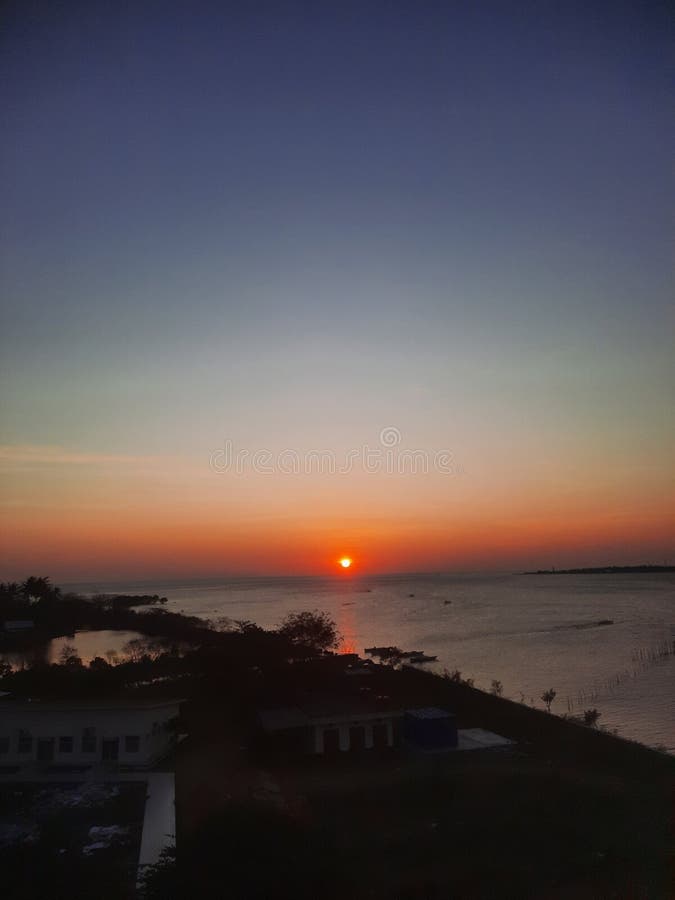 Sunset Photo with Bright Orange Light on the Beach Stock Image - Image ...