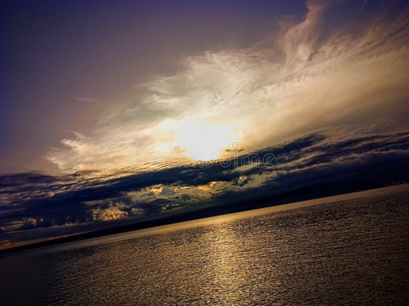 Sunset Photo in the Middle of the Sea Bali Stock Image - Image of ...