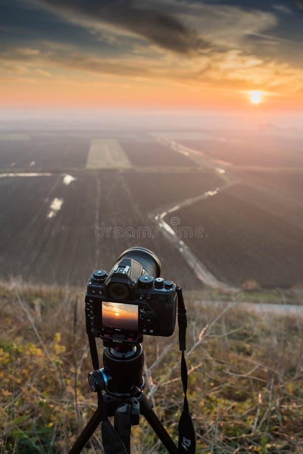 Sunset Photography. Camera with Tripod Sunset Stock Photo - Image of ...