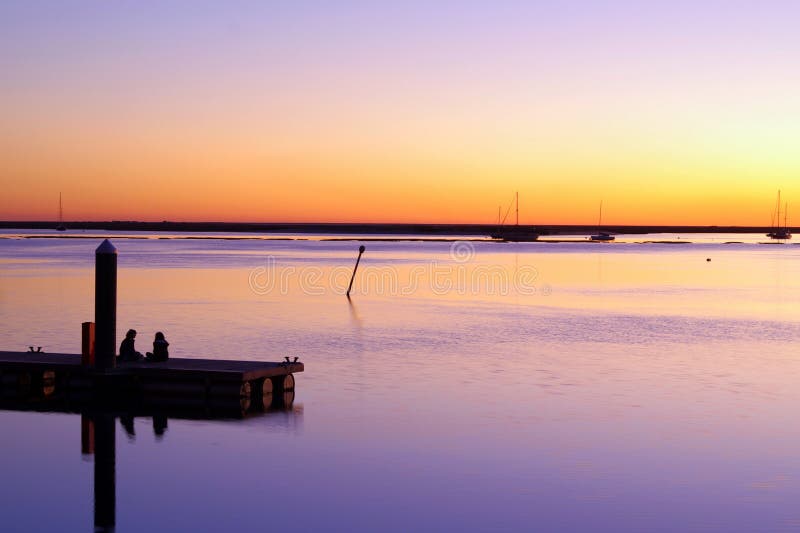 Sunset at the pier stock photo. Image of purple, pier - 23160102