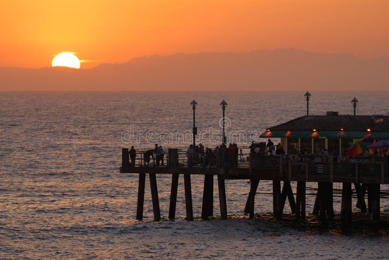 Sunset from the Pier stock photo. Image of water, mountains - 2689588