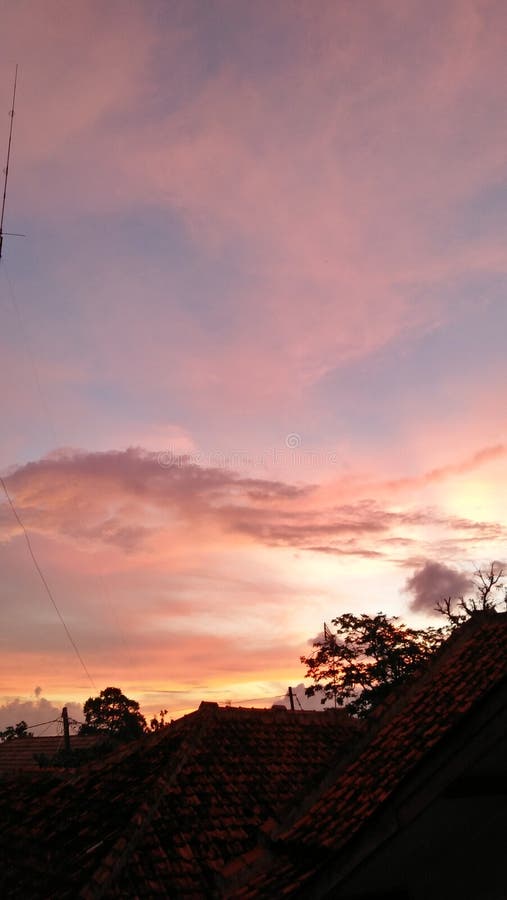 Sunset Pink and Blue Sky Rooftop Home Stock Image - Image of sunset ...