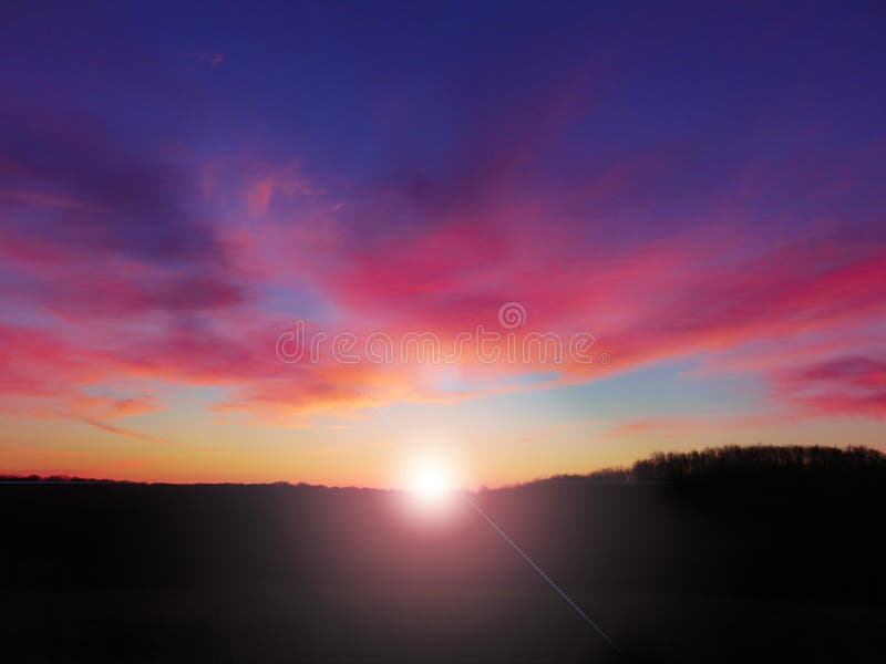 Sunset with Pink Clouds Over a Dark Horizon Stock Photo - Image of ...
