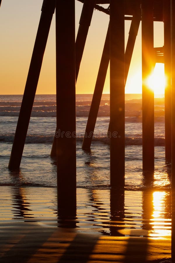 View from Under the Pier during Sunset Stock Photo - Image of ...