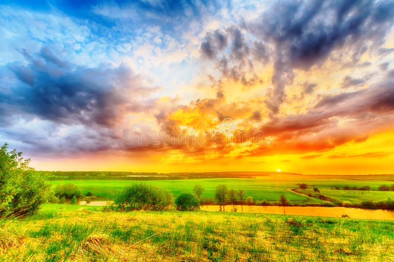 Sunset on the plain stock image. Image of pond, orange - 40852385