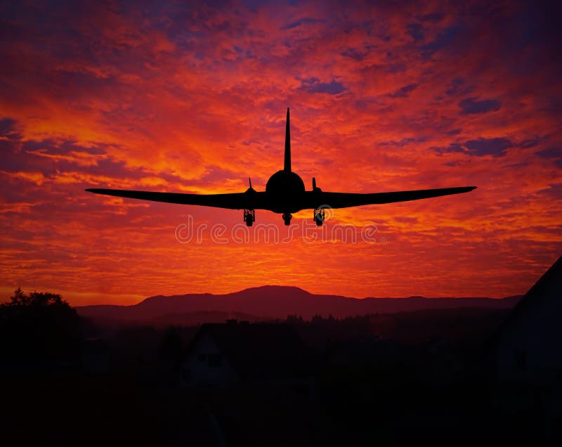 Sunset with a Plane Silhouette Stock Photo - Image of plane, direct ...