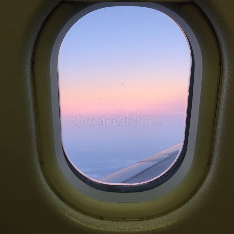 Sunset from a plane window stock photo. Image of harbour - 53493364