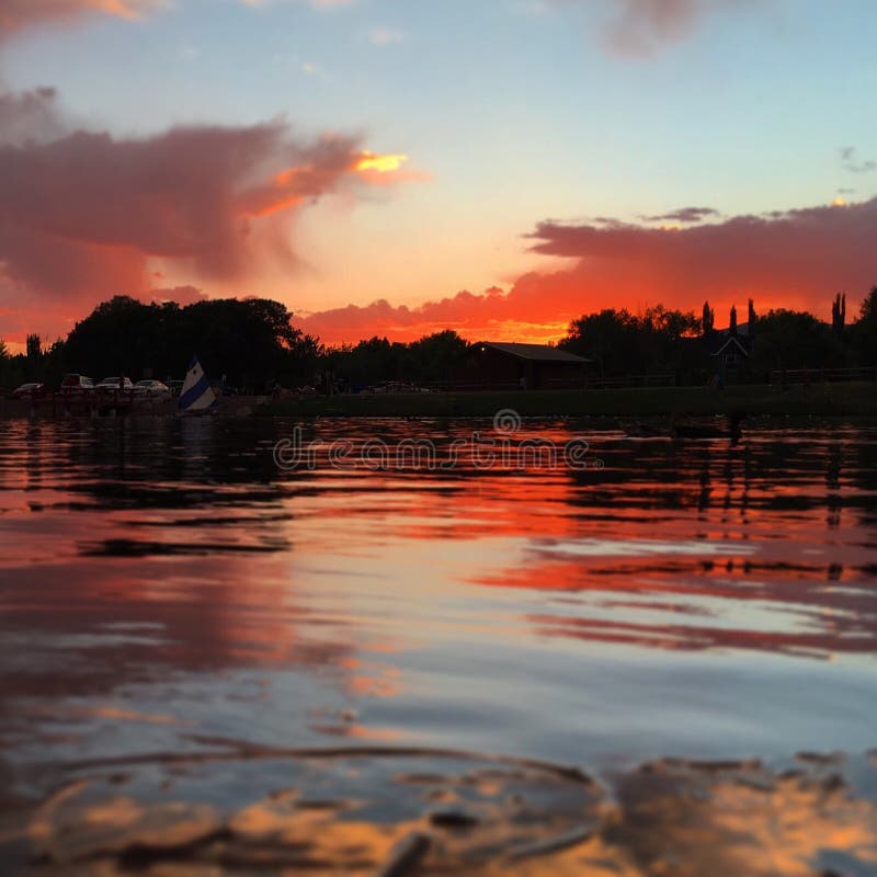 Sunset Pond stock photo. Image of sunset, orange, sets - 79639842