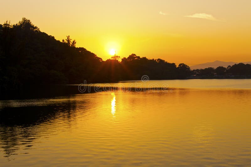 Sunset pond in Hong Kong stock image. Image of relaxation - 35094969