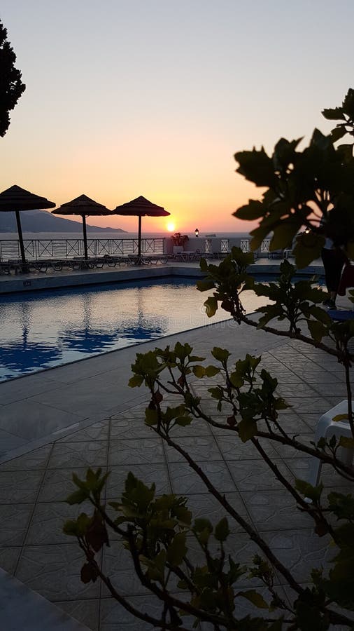 Sunset by the pool stock image. Image of nature, sunset - 134116305