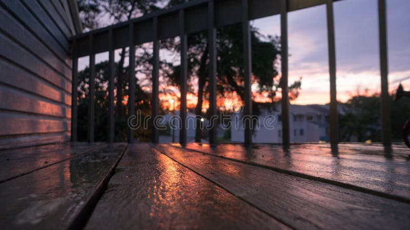 Sunset from a porch stock image. Image of yellow, beauty - 106236023