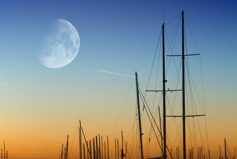 Sunset on the port stock photo. Image of moon, night - 19302006