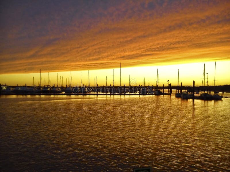 Sunset at the port stock photo. Image of view, mast, boat - 58759120