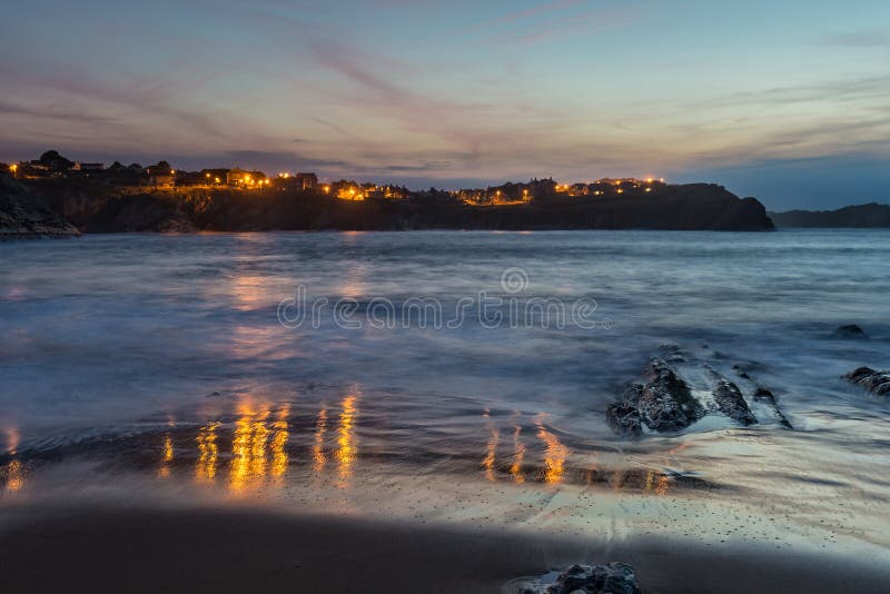 Sunset at the Portio Beach in Spain Stock Image - Image of stone, rock ...