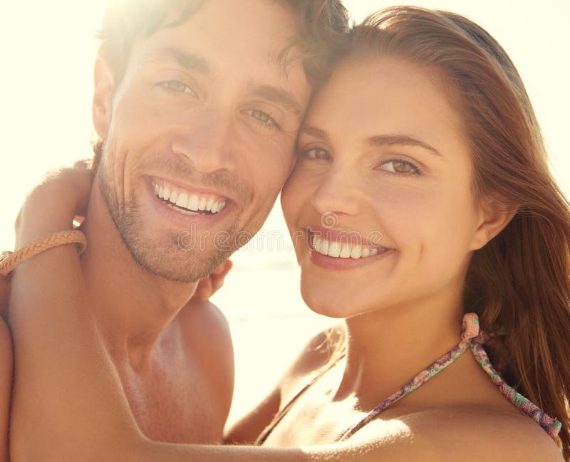 Sunset Portrait And Happy Couple Hug At A Beach For Summer Adventure