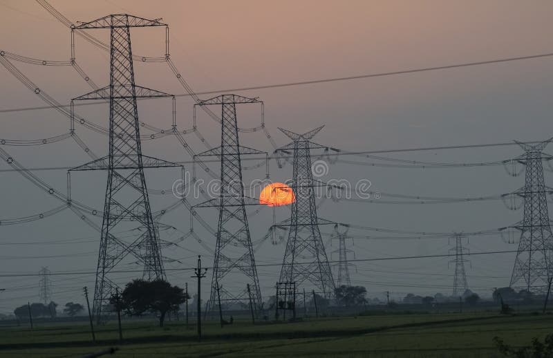 Sunset through the Power Grid Cables and Tower Stock Image - Image of ...
