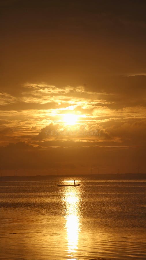 Sunset at puttalam lagoon stock image. Image of sunlight - 277653349